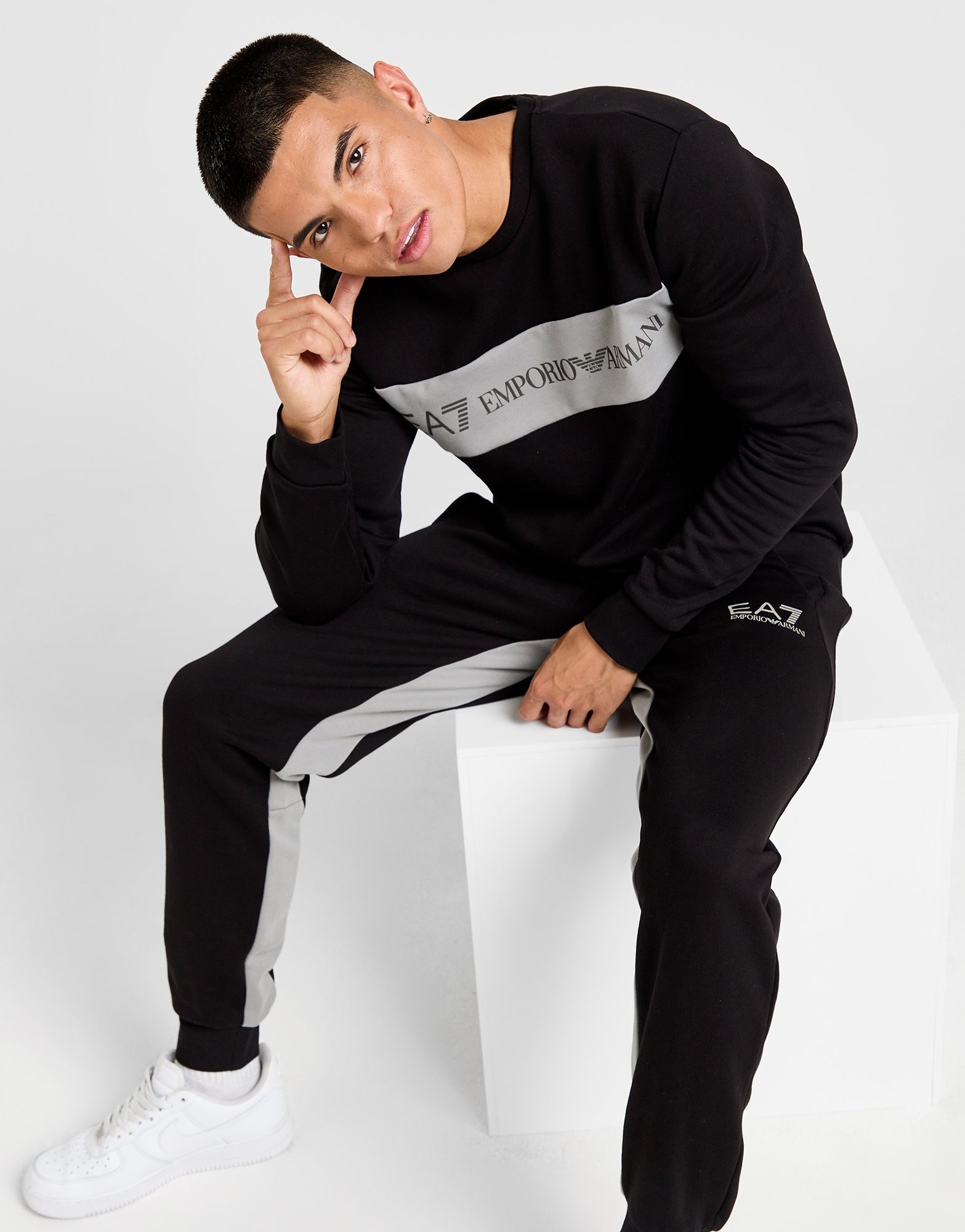 EA7 Emporio Armani Colour Block Crew Tracksuit in Nero | JD Sports