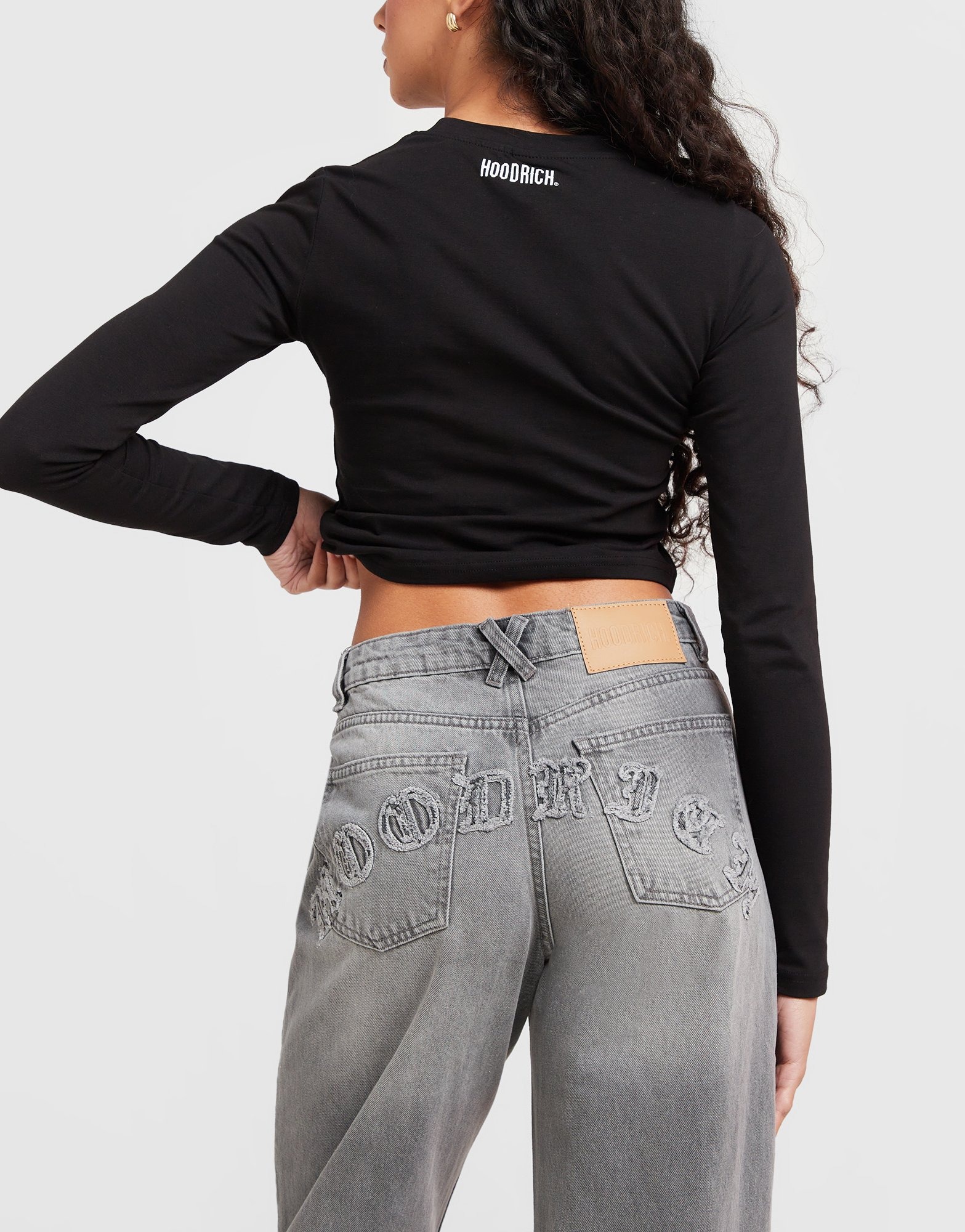 Hoodrich Jeans Logo Applique in Nero | JD Sports