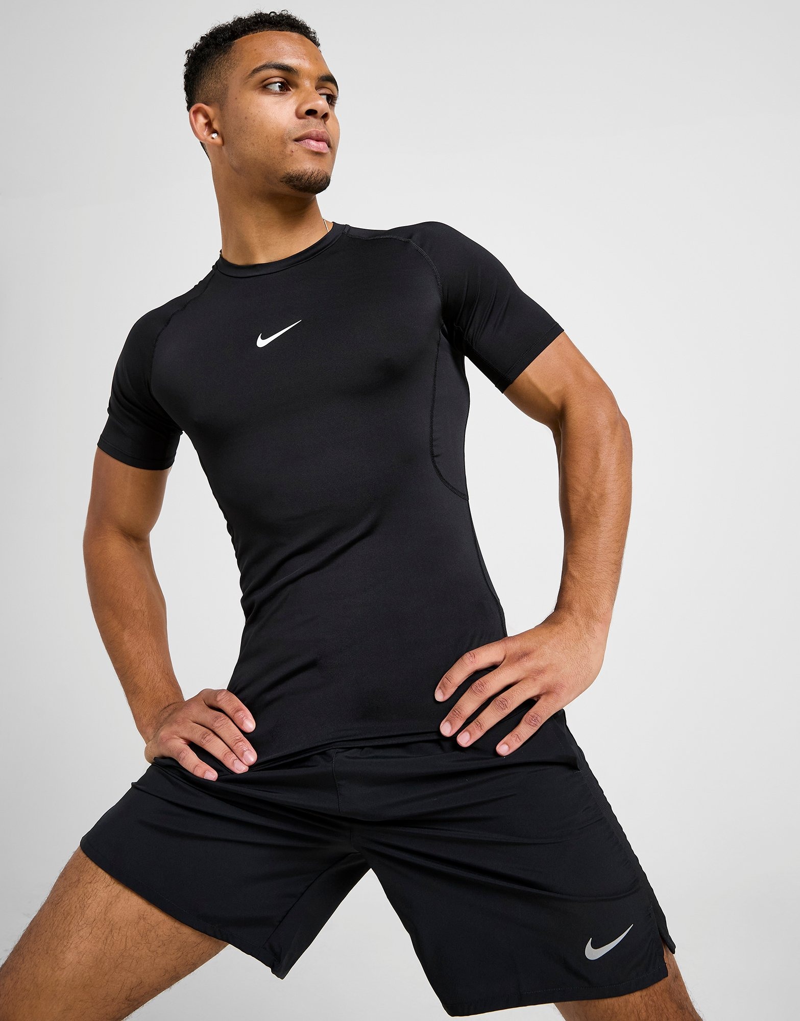 Zwart Nike Dri-FIT strakke fitnesstop met korte mouwen voor heren Pro ...