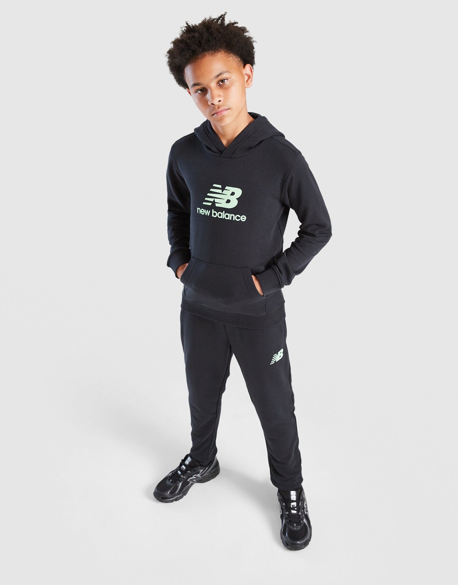 New Balance Chándal Stack Júnior en Negro - JD Sports España