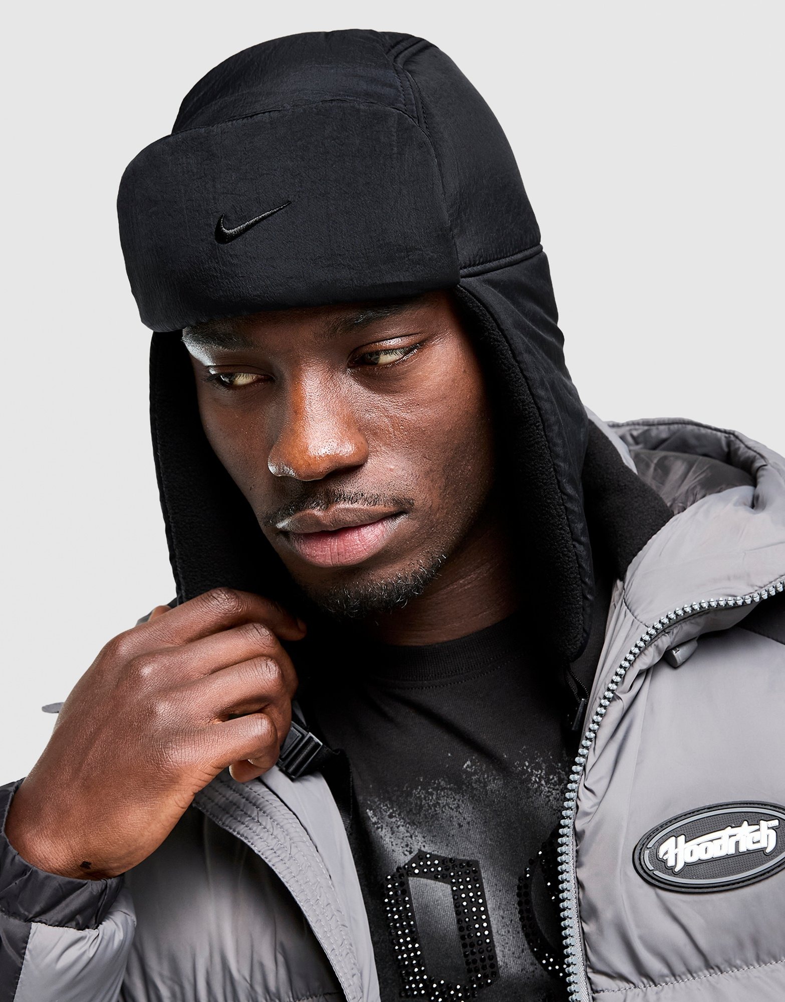 Black Nike Fly Unstructured Puffer Trapper Cap | JD Sports UK