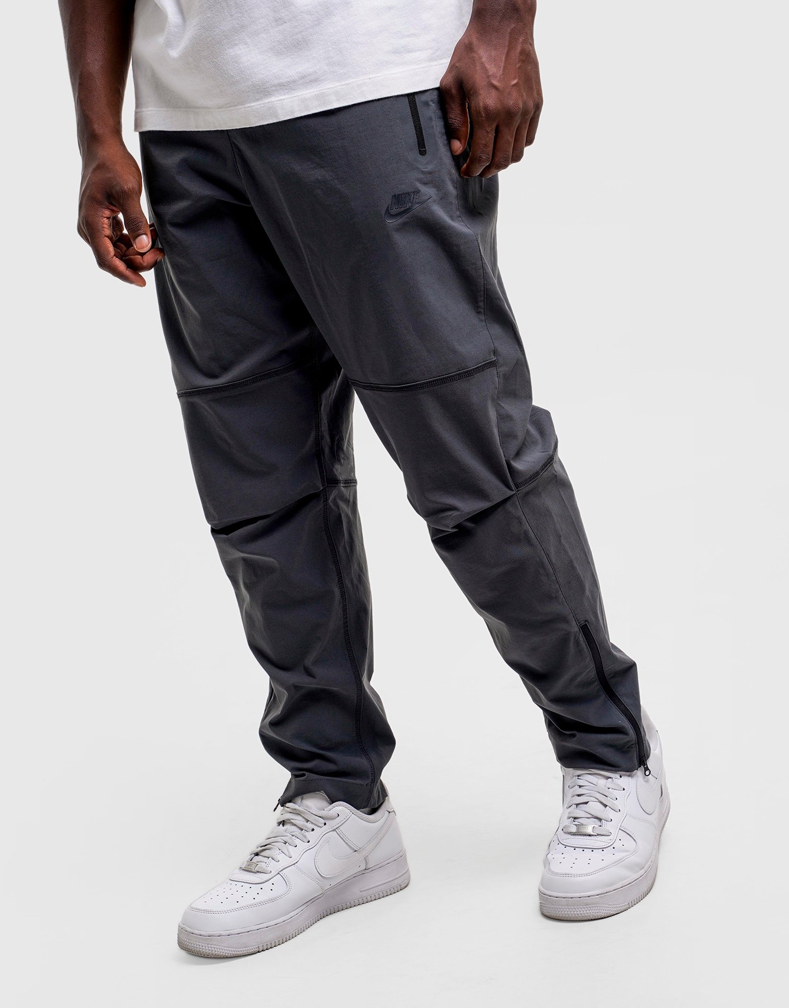 Grey Nike TECH WOVEN PANTS LIGHT | JD Sports UK