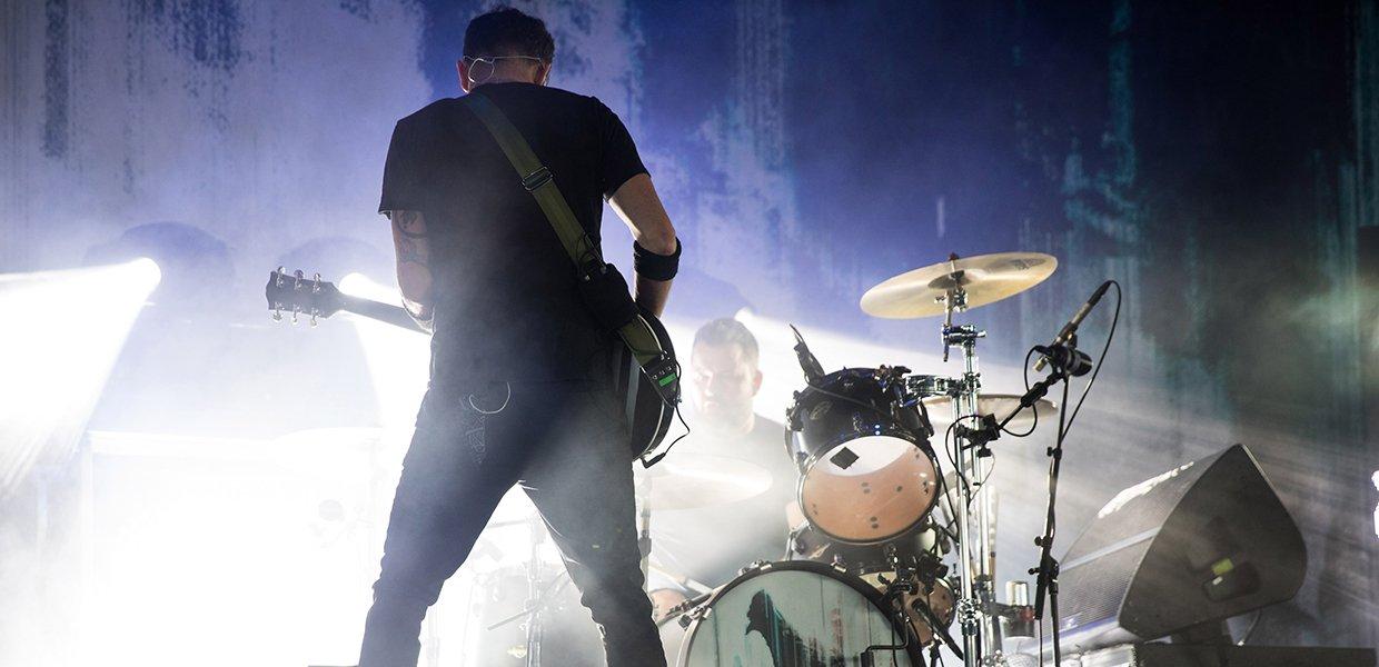 Rise Against: Tim McIlrath's favorite protest songs of all time ...