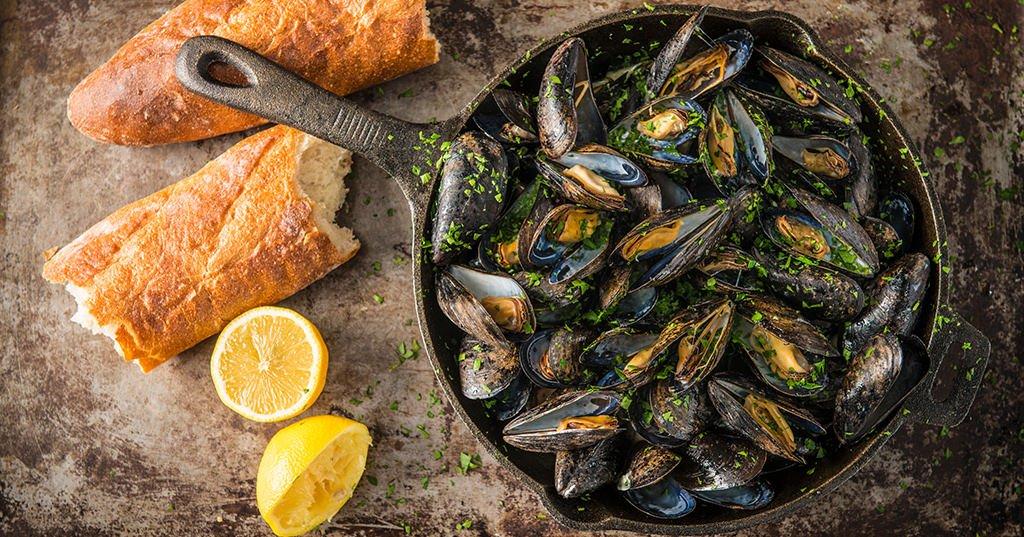 Grilled Mussels with Lemon Butter Recipe | Traeger Grills