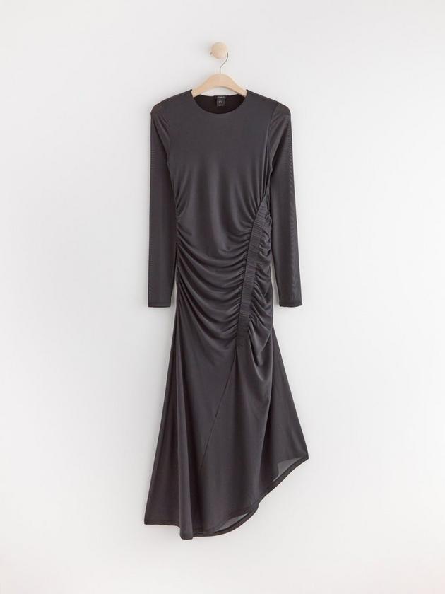 Midi dress with asymmetrical shape | Lindex Midi dress with asymmetrical shape | Lindex
