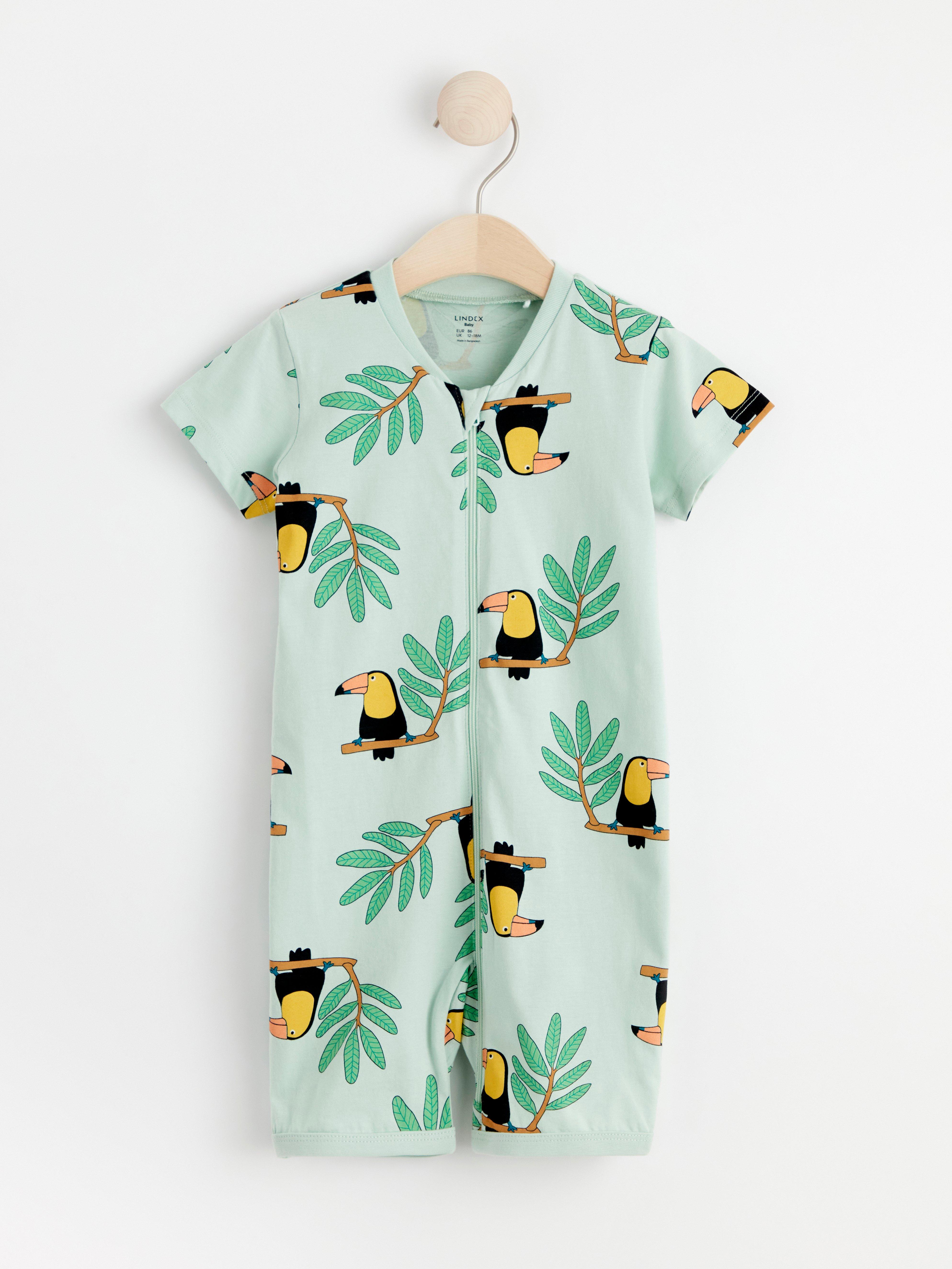 Pyjama romper with toucans | Lindex Poland
